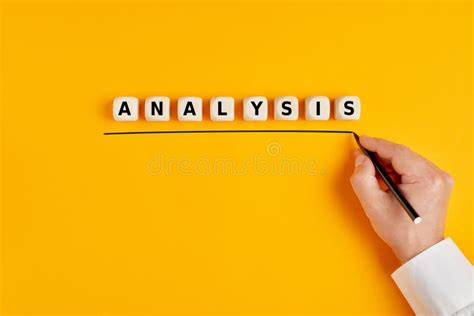 Male Hand Is Writing Analysis On Yellow Background Stock Image Image
