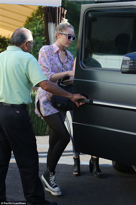 Miley Cyrus Steps Out In Just A Shirt And Sheer Stockings In California Daily Mail Online