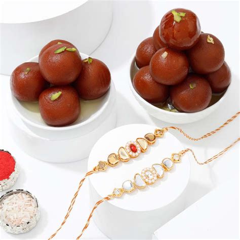 Buysend Exquisite Pearlwork Rakhis And Gulab Jamun Combo Online Igp