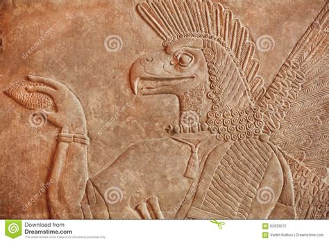 Historical Assyrian Relief Of Bird Face Genie Made In 850bc Editorial