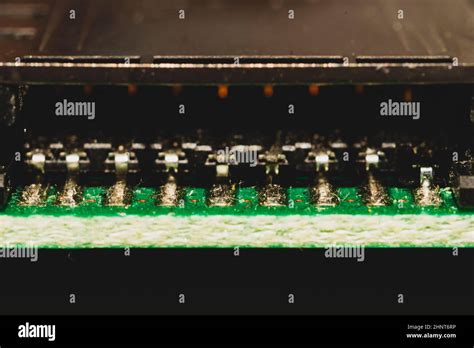 Power Socket On Motherboard Connector On The Circuit Board Of Computer Close Up Adapter Pins