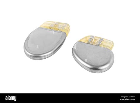 Pacemaker Isolated On A White Background Heart Battery Close Up Of Cardiac Pacemaker On