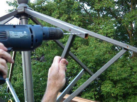 Man Shares Trick For Installing A Sturdy Bird Feeder Pole In The Lawn