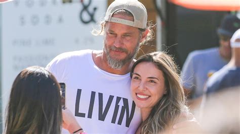 Vikings Babe Swallows Universe Star Travis Fimmel At Gold Coast Surf Open With Travla Beer