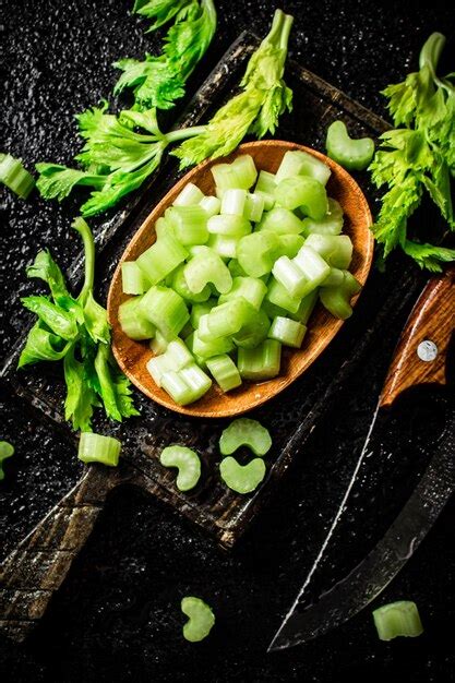 Premium Photo Fresh Celery Slices On A Cutting Board