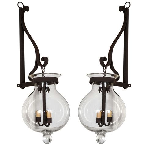 A Pair Of Vintage Iron And Hand Blown Glass Sconces At 1stdibs