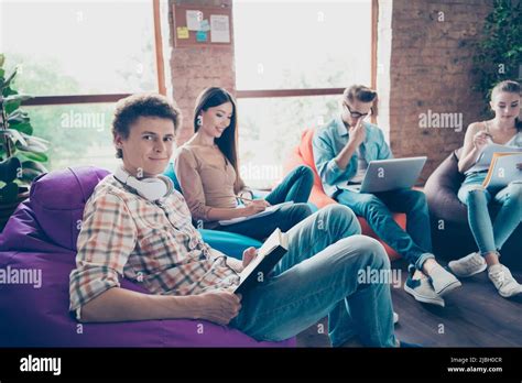 Photo Of Charming Cute Workers Group Sitting Dorm Reading Novel Working