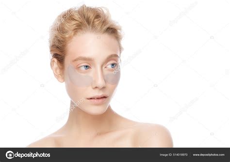Beautiful Girl Standing With Naked Shoulders Wearing Eye Patches