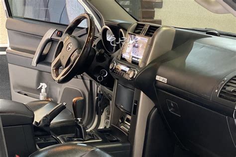 تویوتا پرادو دو در 4 سیلندر کارکرد ۱۳۲هزار کیلومتر بدنه بدون رنگ اتوماتیک