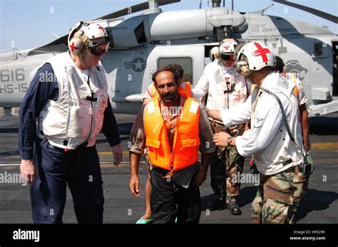 Crew Aboard Uss John F Kennedy Cv 67 Assist Iranian Mariners Rescued