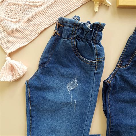 شلوار جینلی دخترانه بچه‌گانه مام‌استایل کمرکش تا تینیجری