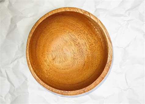 Small Wooden Bowl On White Textured Paper Background Rustic Eco Friendly Tableware For Food