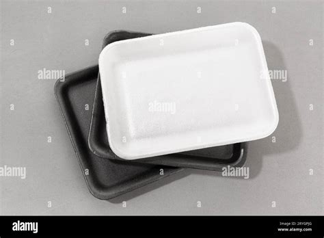 Group Of Styrofoam Trays Used For Food Black And White Disposable Polystyrene Trays Isolated On