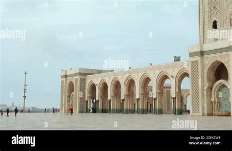 People Walking The Hassan Ii Mosque Plaza Casablanca Morocco Stock