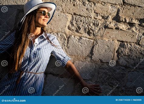 Happy Young Woman Having Fun On City Street During Summer Vacation