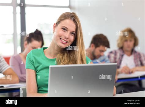 Female Babe Using Laptop In Classroom Stock Photo Alamy