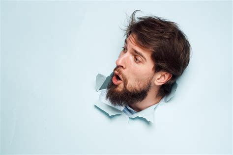 Premium Photo A Mans Head Peeps Out From Behind A Wall Of Emotion Job