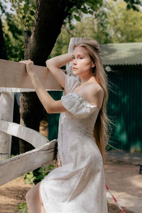Young Model In An Off The Shoulder Summer Dress At The Farm · Free