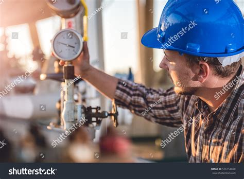 Stock Photo Man Checking Manometer In Natural Gas Factory 576154828 1 Intec1