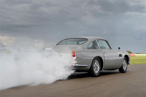 This Aston Martin Db5 Comes With A Rear Smoke Screen And Twin Front Machine Guns Maxim