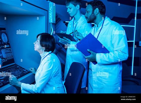 Exploring Tomorrow Three Scientists Collaborate Near Futuristic