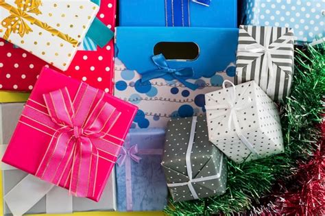 Premium Photo Colorful T Surprise Packages On Pink Background