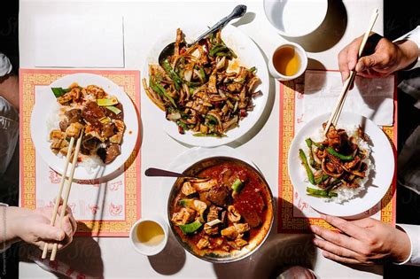 traditional chinese restaurant dinner setting by stocksy contributor