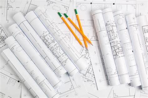 Premium Photo Paper Architectural Drawings Blueprint And Pencil Engineering Blueprint