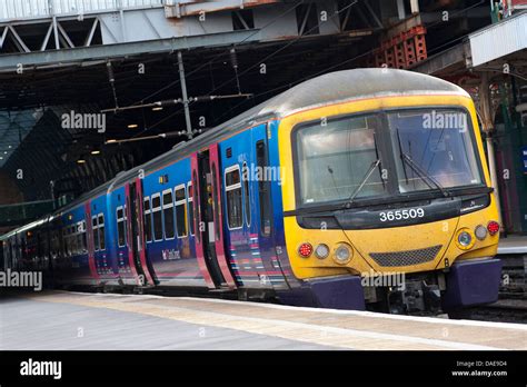 Class 365 Train In First Capital Connect Livery Waiting At A Platform