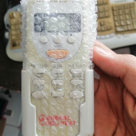 خرید و قیمت ریموت کنترل کولر گازی جنرال شکار پس کرایه از غرفه دماکنترل