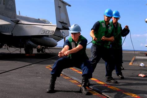 Us Navy 090815 N 2600h 016 Sailors Aboard The Aircraft Carrier Uss
