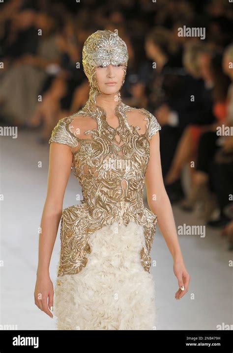 A Model Displays A Creation By British Fashion Designer Sarah Burton