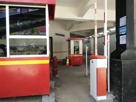 Sistem Parkir Otomatis Dengan Barcode Scanner And Rfid Semi Manless