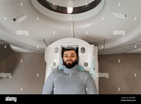 Ct Scan Of Brains Of Man In Medical Clinic Man Is Doing Computed Tomography X Ray Examination