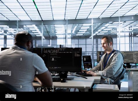 Computer Scientists In Data Center Coordinating Deployment Of Server Architecture Improving