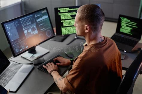 Male Developer Typing Keyboard Computer Workstation Working Office