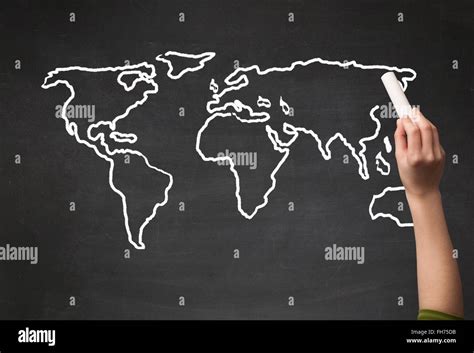 Adult Drawing World Map On Chalkboard Stock Photo Alamy