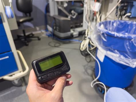 Premium Photo Pager Is A Small Wireless Device That Receives And Displays Numeric Or Text