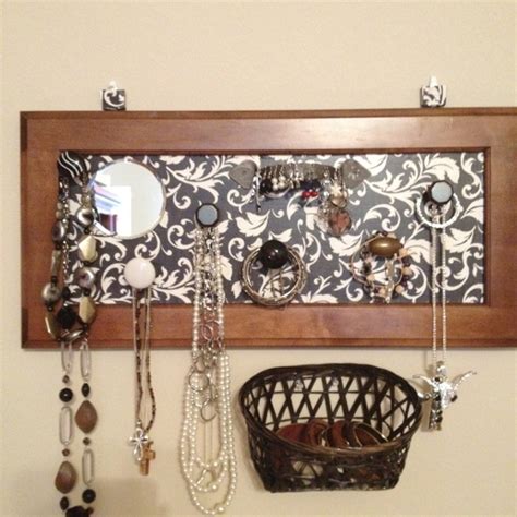 Repurposed Cabinet Doors And Cheap Knobs And Mirror Cabinet Doors