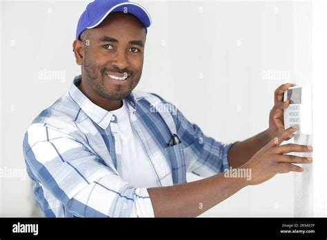 Installing A Programmable Room Thermostat Stock Photo Alamy