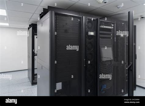 Data Center With Multiple Rows Of Fully Operational Server Racks Modern Telecommunications