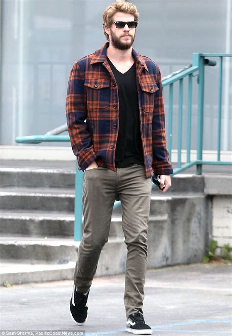 Miley Cyrus Covers Up For Once In Baggy Jumper And Leaves The
