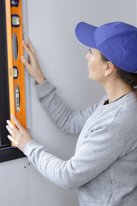 Female Decorator Measuring Window Frame Stock Image Image Of Install