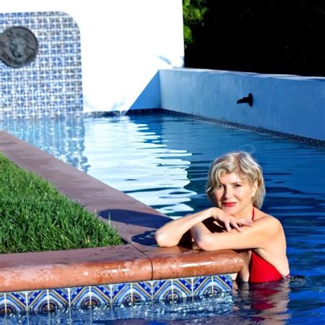 Beth Broderick Shows Off Her Bikini Body While ‘pooling Around Us Weekly