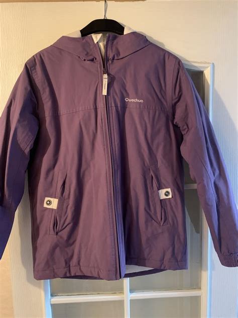 Жіноча куртка вітровка Quechua з капюшоном — ціна 1190 грн у каталозі Куртки Купити жіночі речі