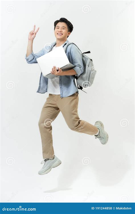 Asian Programmer Seen Typing Code For A User Interface Design On Dual Monitors Royalty Free