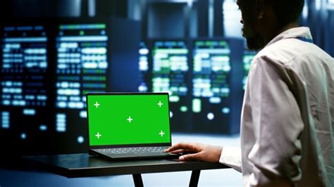 Premium Photo Electrician Using Chroma Key Laptop