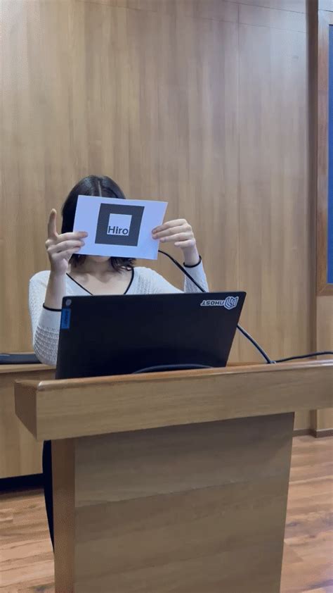 Augmenting A Box On A Hiro Marker Using Marker Based Augmented Reality