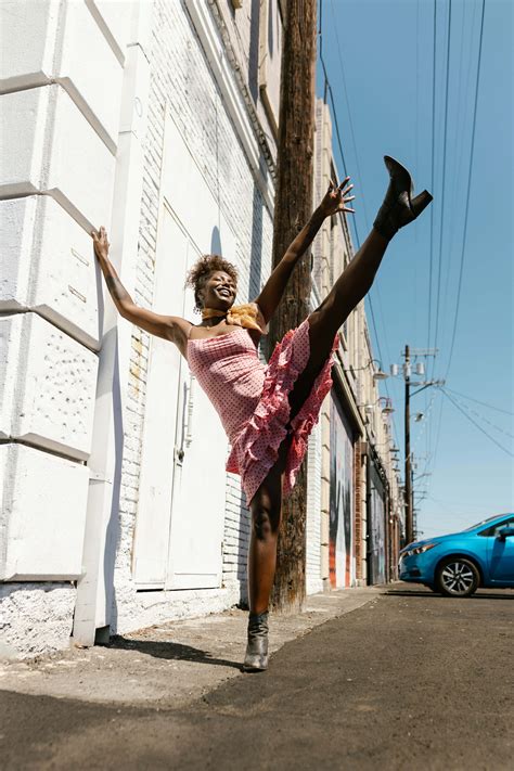 Download Legs Spread While In Boots Wallpaper