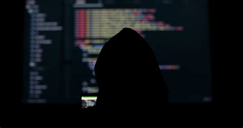 hacker in hood working in dark abstract room stock footage sbv